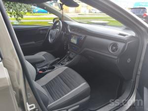 Brown Toyota Auris 2019 in Riga, with an engine capacity of 1.60 L and mileage of 122 thousand km for 12900 €, photo 16 on AUTOMOTO.COM.LV