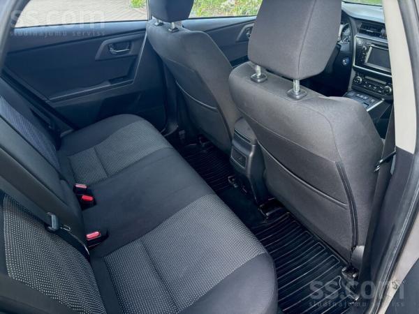 Brown Toyota Auris 2013 in Riga, with an engine capacity of 1.80 L and mileage of 243 thousand km for 6500 €, photo 10 on AUTOMOTO.COM.LV