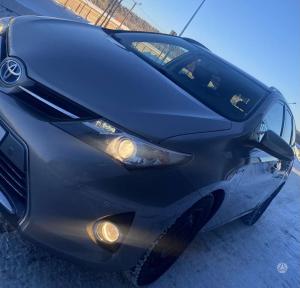 Brown Toyota Auris 2014 in Vilnius, with an engine capacity of 1.80 L and mileage of 228 thousand km for 8999 €, photo 9 on AUTOMOTO.COM.LV