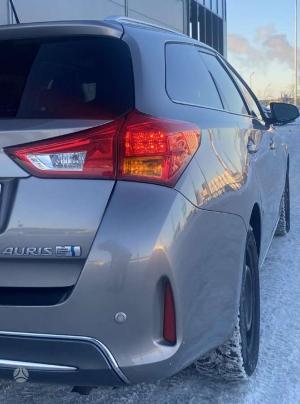 Brown Toyota Auris 2014 in Vilnius, with an engine capacity of 1.80 L and mileage of 228 thousand km for 8999 €, photo 13 on AUTOMOTO.COM.LV