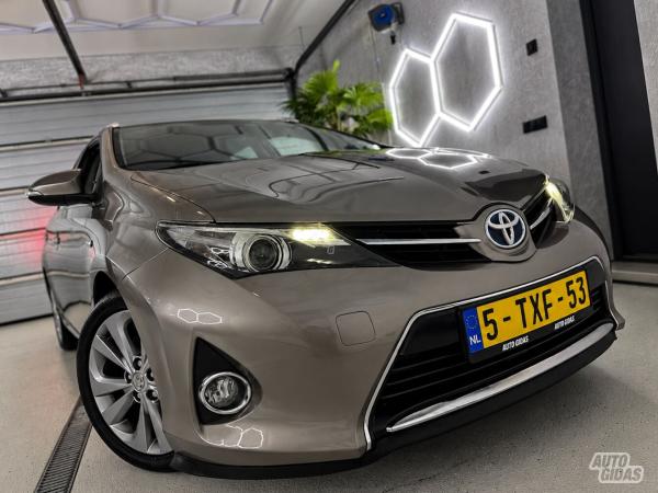 Brown Toyota Auris 2014 in Kaunas, with an engine capacity of 1.80 L and mileage of 280 thousand km for 7950 €, photo 1 on AUTOMOTO.COM.LV
