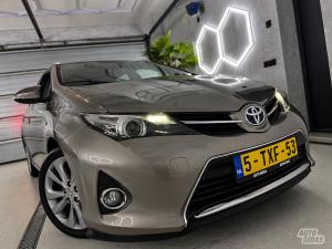 Brown Toyota Auris 2014 in Kaunas, with an engine capacity of 1.80 L and mileage of 280 thousand km for 7950 €, photo  on AUTOMOTO.COM.LV