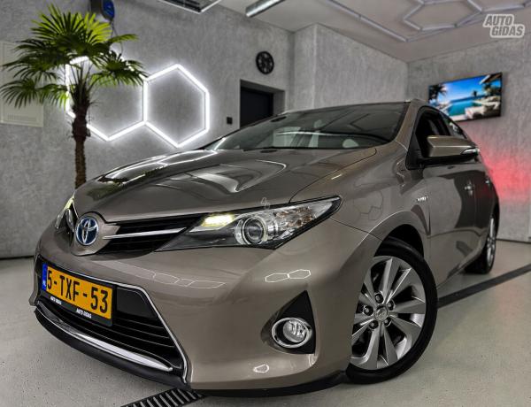 Brown Toyota Auris 2014 in Kaunas, with an engine capacity of 1.80 L and mileage of 280 thousand km for 7950 €, photo 7 on AUTOMOTO.COM.LV