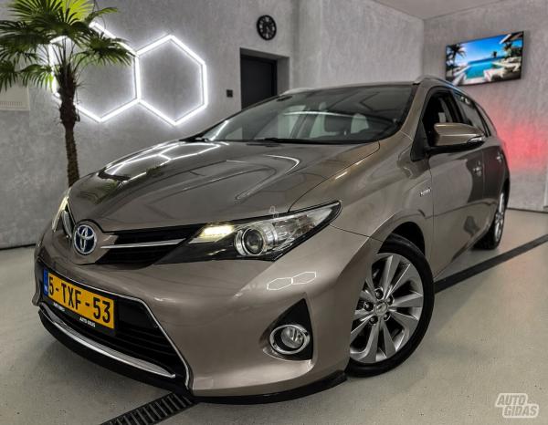 Brown Toyota Auris 2014 in Kaunas, with an engine capacity of 1.80 L and mileage of 280 thousand km for 7950 €, photo 9 on AUTOMOTO.COM.LV