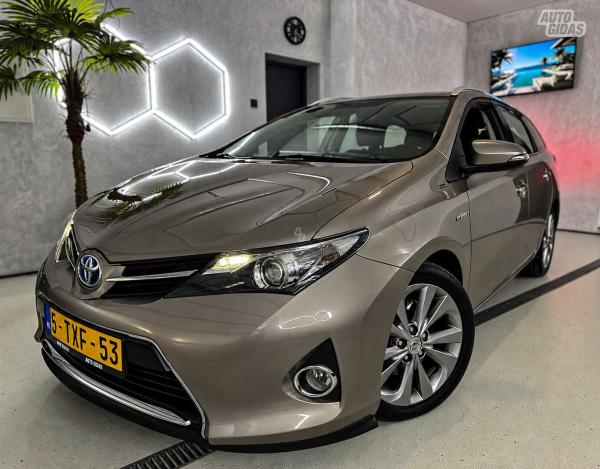 Brown Toyota Auris 2014 in Kaunas, with an engine capacity of 1.80 L and mileage of 280 thousand km for 7950 €, photo 11 on AUTOMOTO.COM.LV