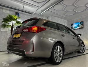 Brown Toyota Auris 2014 in Kaunas, with an engine capacity of 1.80 L and mileage of 280 thousand km for 7950 €, photo 12 on AUTOMOTO.COM.LV