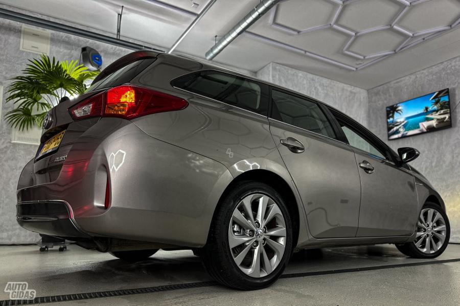 Brown Toyota Auris 2014 in Kaunas, with an engine capacity of 1.80 L and mileage of 280 thousand km for 7950 €, photo 14 on AUTOMOTO.COM.LV
