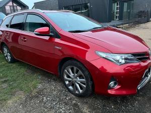 Brown Toyota Auris 2015 in Kaunas, with an engine capacity of 1.80 L and mileage of 260 thousand km for 7950 €, photo  on AUTOMOTO.COM.LV