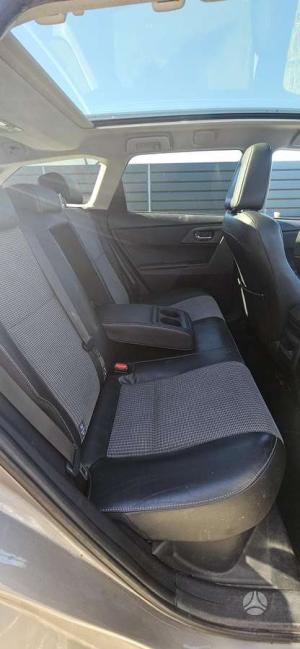 Brown Toyota Auris 2015 in Klaipeda, with an engine capacity of 1.80 L and mileage of 216 thousand km for 9700 €, photo 12 on AUTOMOTO.COM.LV