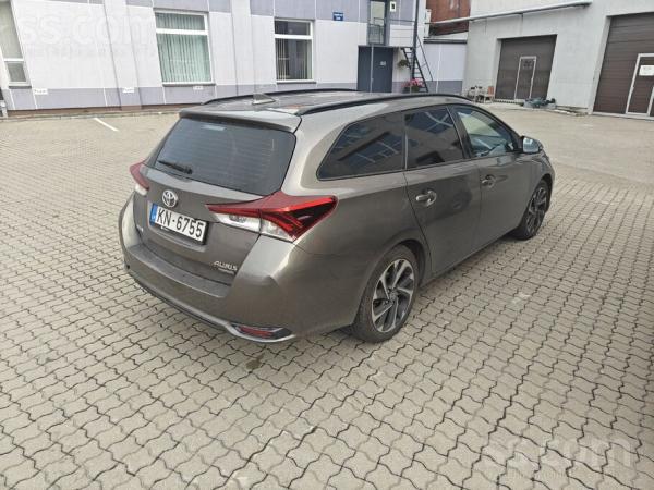 Brūns Toyota Auris 2016 Rīga, ar dzinēja tilpumu 1.60 L un nobraukumu 199 tūkst. km par 7600 €, foto 5 vietnē AUTOMOTO.COM.LV
