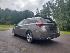 Brown Toyota Auris 2017 in Vilnius, with an engine capacity of 1.80 L and mileage of 310 thousand km for 9700 €, photo 4 on AUTOMOTO.COM.LV