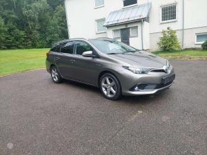 Brown Toyota Auris 2017 in Vilnius, with an engine capacity of 1.80 L and mileage of 310 thousand km for 9700 €, photo 6 on AUTOMOTO.COM.LV