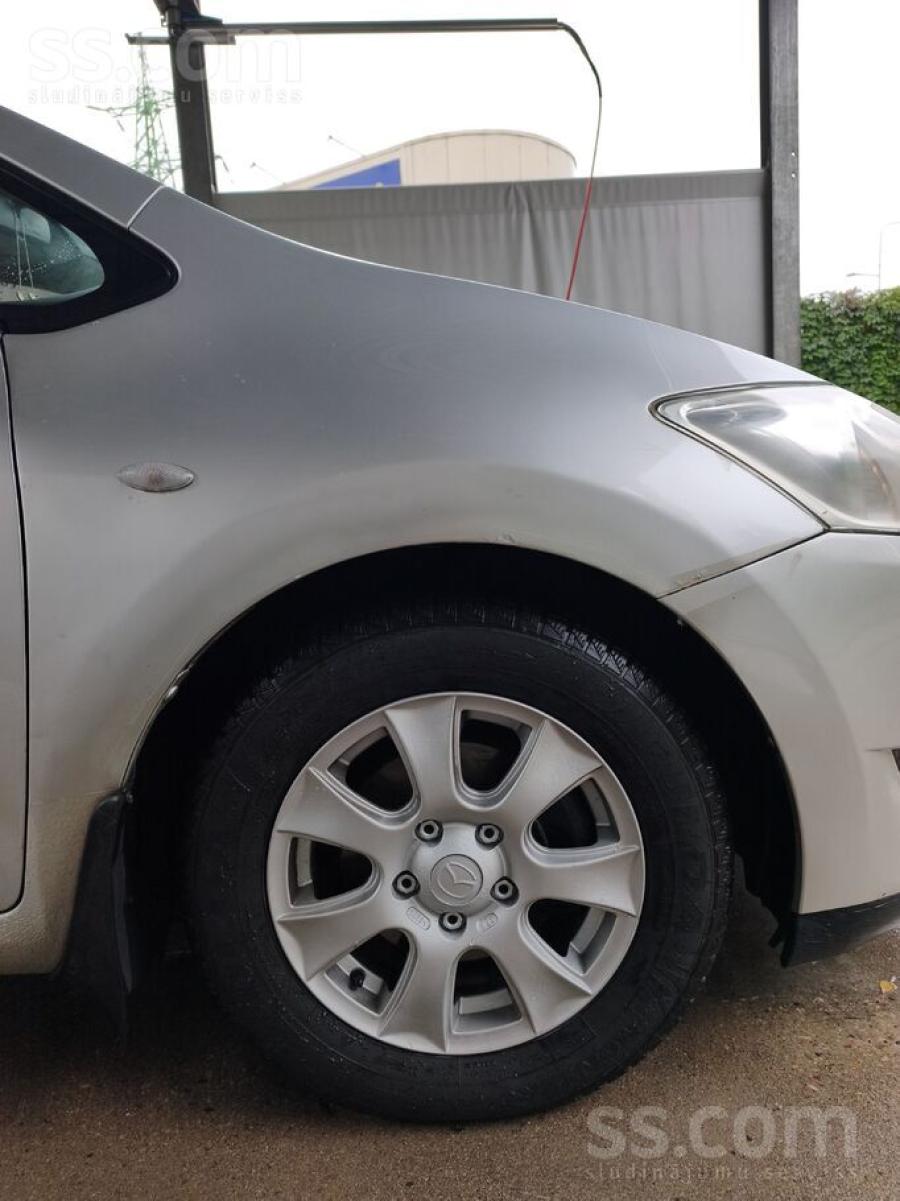 Grey Toyota Auris 2007 in Riga, with an engine capacity of 1.40 L and mileage of 310 thousand km for 2150 €, photo 11 on AUTOMOTO.COM.LV