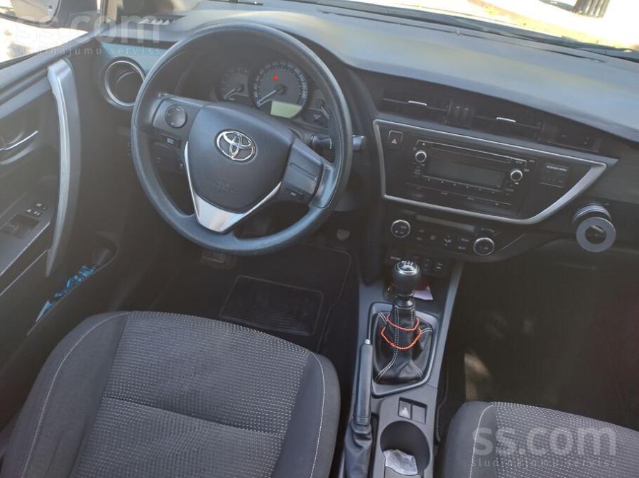 Grey Toyota Auris 2013 in Ventspils, with an engine capacity of 1.40 L and mileage of 217 thousand km for 6000 €, photo 6 on AUTOMOTO.COM.LV
