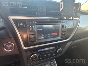 Grey Toyota Auris 2014 in Riga, with an engine capacity of 1.80 L and mileage of 173 thousand km for 8800 €, photo 7 on AUTOMOTO.COM.LV