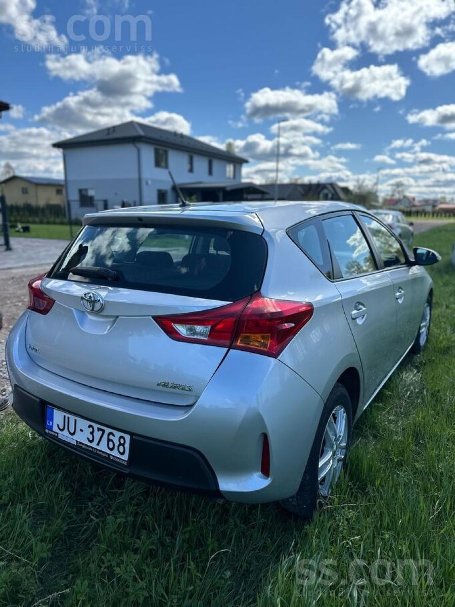 Pelēks Toyota Auris 2015 Rīga, ar dzinēja tilpumu 1.30 L un nobraukumu 220 tūkst. km par 5700 €, foto 5 vietnē AUTOMOTO.COM.LV