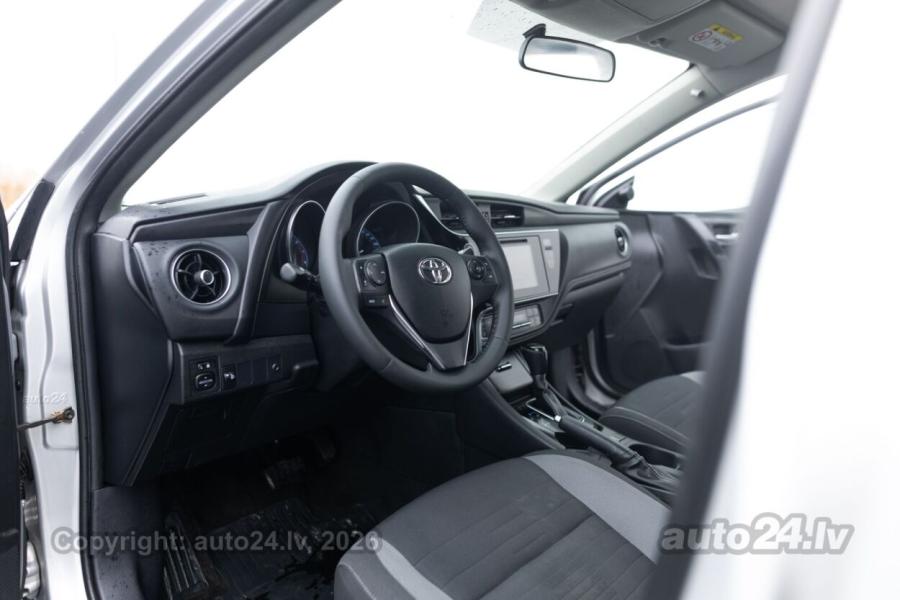 Grey Toyota Auris 2016 in Tallinn, with an engine capacity of 1.60 L and mileage of 127 thousand km for 9990 €, photo 12 on AUTOMOTO.COM.LV