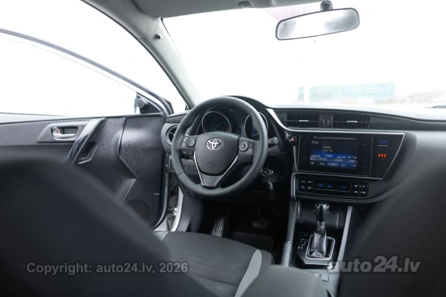 Grey Toyota Auris 2016 in Tallinn, with an engine capacity of 1.60 L and mileage of 127 thousand km for 9990 €, photo 15 on AUTOMOTO.COM.LV
