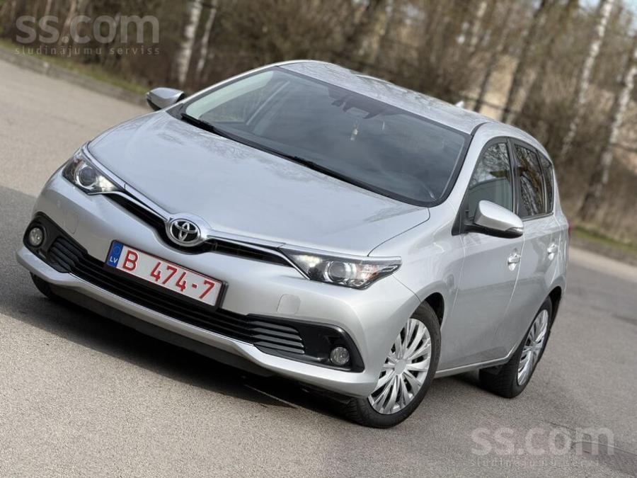 Pelēks Toyota Auris 2016 Rīga, ar dzinēja tilpumu 1.60 L un nobraukumu 0 tūkst. km par 6970 €, foto 1 vietnē AUTOMOTO.COM.LV