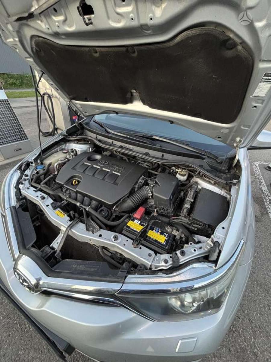 Grey Toyota Auris 2016 in Vilnius, with an engine capacity of 1.60 L and mileage of 88 thousand km for 10500 €, photo 14 on AUTOMOTO.COM.LV