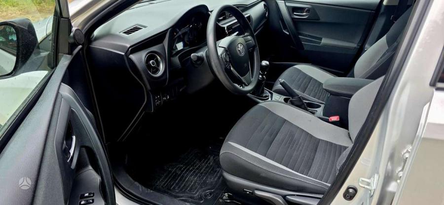 Grey Toyota Auris 2016 in Siauliai, with an engine capacity of 1.36 L and mileage of 240 thousand km for 5150 €, photo 22 on AUTOMOTO.COM.LV