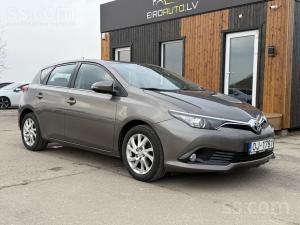 Grey Toyota Auris 2018 in Riga, with an engine capacity of 1.60 L and mileage of 229 thousand km for 10450 €, photo  on AUTOMOTO.COM.LV