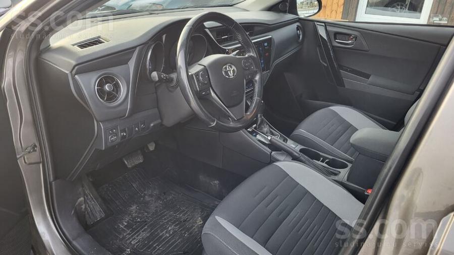 Grey Toyota Auris 2018 in Riga, with an engine capacity of 1.60 L and mileage of 229 thousand km for 10450 €, photo 10 on AUTOMOTO.COM.LV