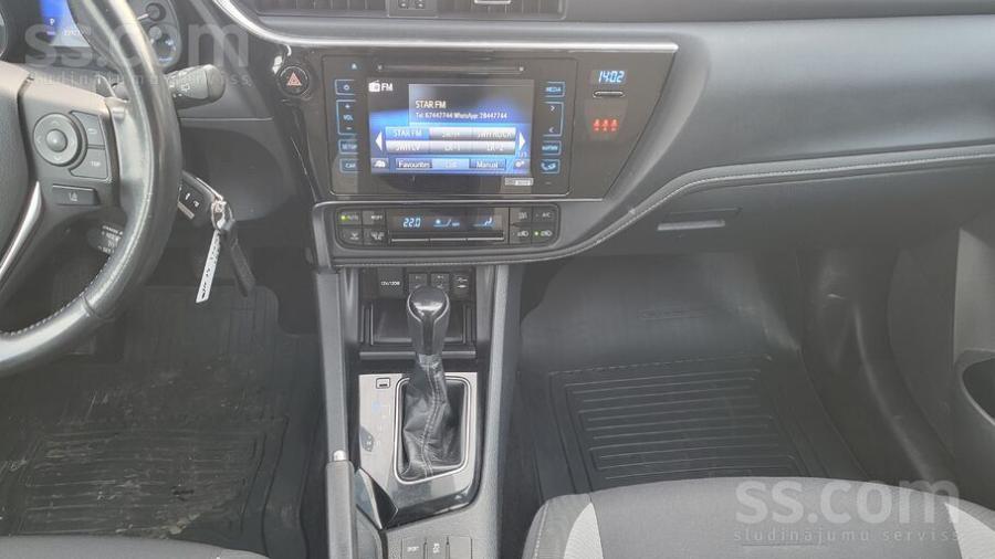 Grey Toyota Auris 2018 in Riga, with an engine capacity of 1.60 L and mileage of 229 thousand km for 10450 €, photo 11 on AUTOMOTO.COM.LV