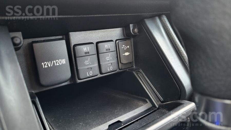 Grey Toyota Auris 2018 in Riga, with an engine capacity of 1.60 L and mileage of 229 thousand km for 10450 €, photo 13 on AUTOMOTO.COM.LV