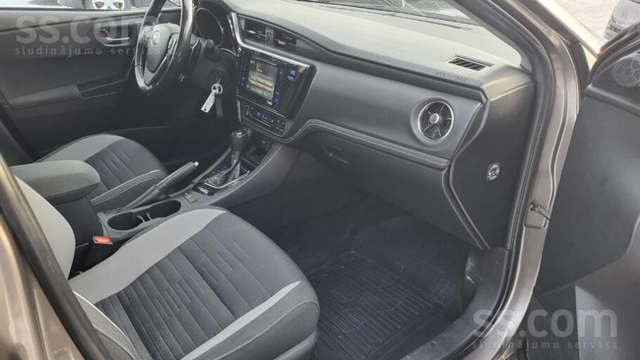 Grey Toyota Auris 2018 in Riga, with an engine capacity of 1.60 L and mileage of 229 thousand km for 10450 €, photo 14 on AUTOMOTO.COM.LV