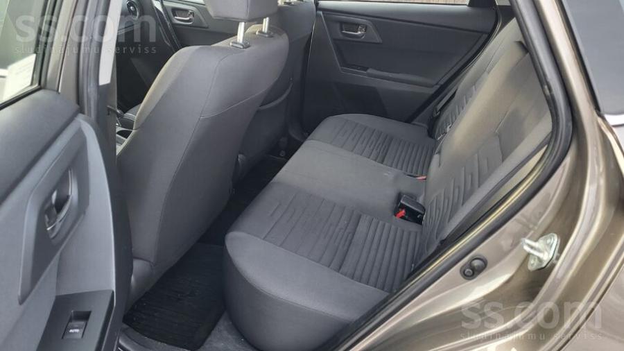 Grey Toyota Auris 2018 in Riga, with an engine capacity of 1.60 L and mileage of 229 thousand km for 10450 €, photo 16 on AUTOMOTO.COM.LV