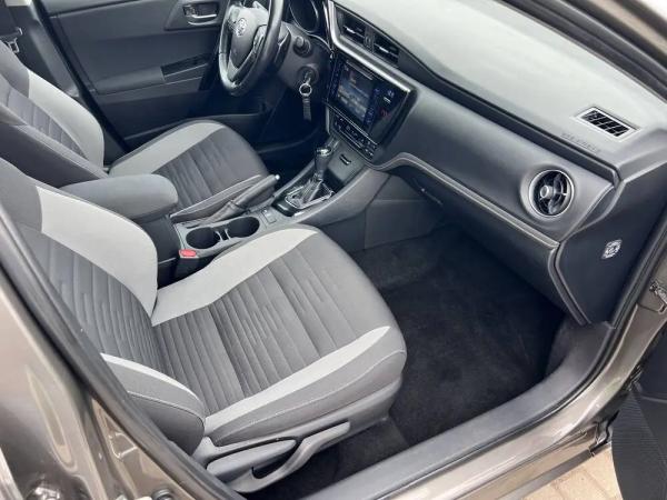 Grey Toyota Auris 2018 in Riga, with an engine capacity of 1.60 L and mileage of 151 thousand km for 9950 €, photo 10 on AUTOMOTO.COM.LV