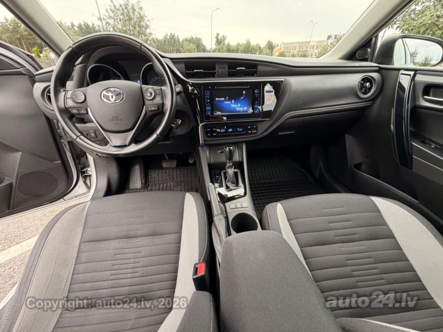 Grey Toyota Auris 2018 in Tallinn, with an engine capacity of 1.60 L and mileage of 119 thousand km for 9999 €, photo 16 on AUTOMOTO.COM.LV