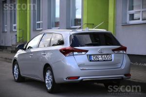 Grey Toyota Auris 2015 in Riga, with an engine capacity of 1.60 L and mileage of 198 thousand km for 7295 €, photo 6 on AUTOMOTO.COM.LV