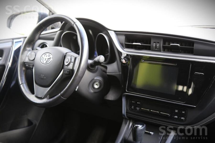 Grey Toyota Auris 2015 in Riga, with an engine capacity of 1.60 L and mileage of 198 thousand km for 7295 €, photo 12 on AUTOMOTO.COM.LV