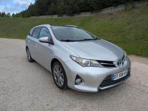 Grey Toyota Auris 2015 in Vilnius, with an engine capacity of 1.80 L and mileage of 254 thousand km for 8500 €, photo 4 on AUTOMOTO.COM.LV
