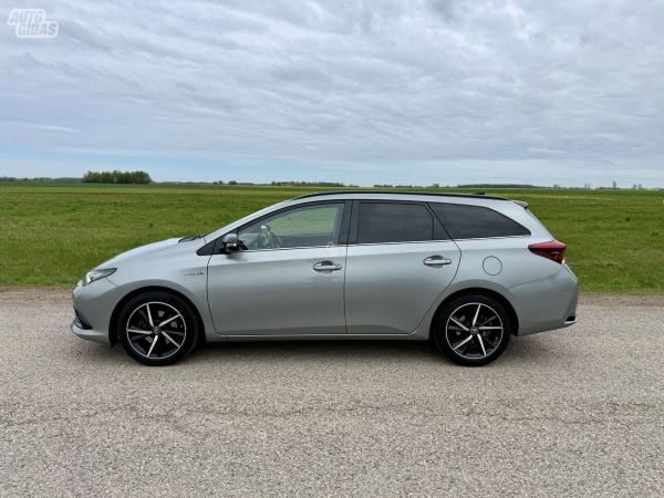 Pelēks Toyota Auris 2018 Vilkaviškis, ar dzinēja tilpumu 1.80 L un nobraukumu 225 tūkst. km par 10900 €, foto 5 vietnē AUTOMOTO.COM.LV