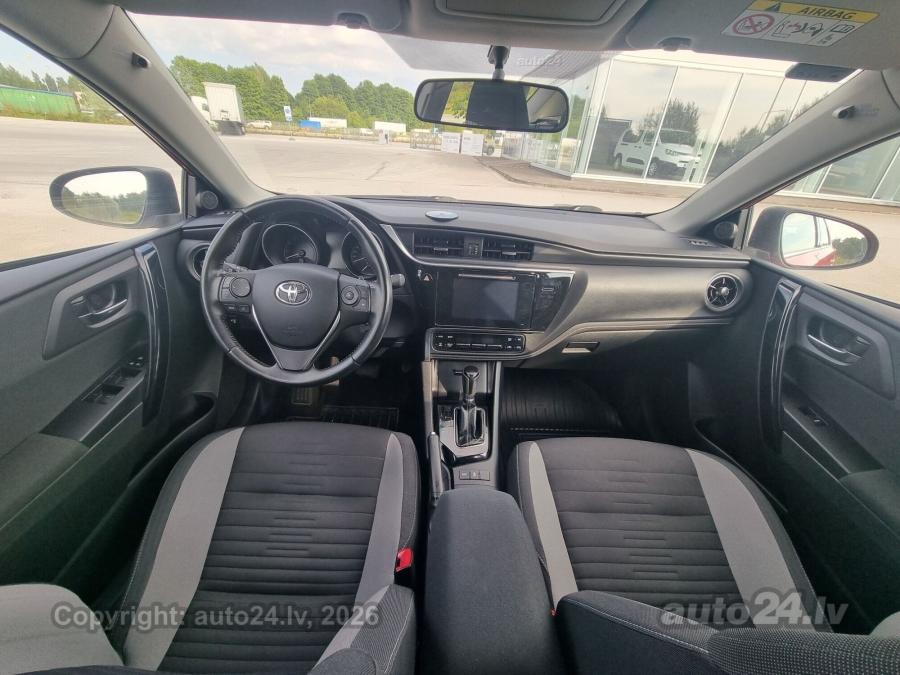 Red Toyota Auris 2016 in Viljandi, with an engine capacity of 1.60 L and mileage of 109 thousand km for 11900 €, photo 7 on AUTOMOTO.COM.LV