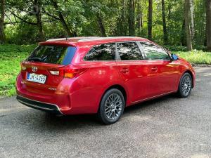 Red Toyota Auris 2013 in Riga, with an engine capacity of 1.40 L and mileage of 0 thousand km for 5599 €, photo 6 on AUTOMOTO.COM.LV