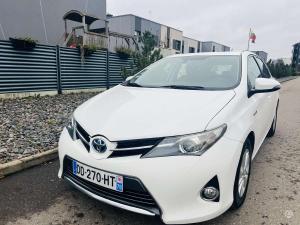White Toyota Auris 2014 in Kaunas, with an engine capacity of 1.80 L and mileage of 242 thousand km for 7450 €, photo 6 on AUTOMOTO.COM.LV