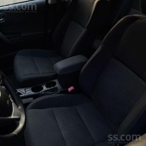 White Toyota Auris 2014 in Jelgava, with an engine capacity of 1.80 L and mileage of 242 thousand km for 7499 €, photo 11 on AUTOMOTO.COM.LV