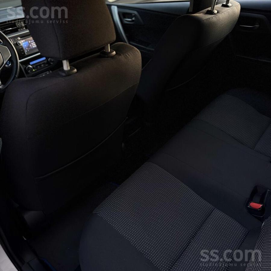 White Toyota Auris 2014 in Jelgava, with an engine capacity of 1.80 L and mileage of 242 thousand km for 7499 €, photo 14 on AUTOMOTO.COM.LV