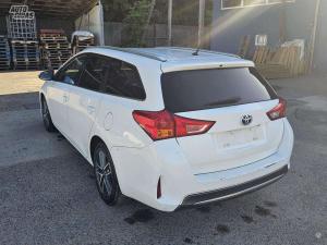 White Toyota Auris 2014 in Vilnius, with an engine capacity of 1.80 L and mileage of 295 thousand km for 6900 €, photo 7 on AUTOMOTO.COM.LV