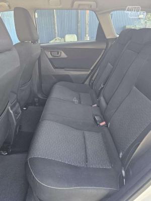 White Toyota Auris 2014 in Vilnius, with an engine capacity of 1.80 L and mileage of 295 thousand km for 6900 €, photo 18 on AUTOMOTO.COM.LV