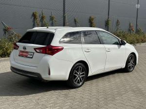 White Toyota Auris 2014 in Vilnius, with an engine capacity of 1.80 L and mileage of 295 thousand km for 5850 €, photo 6 on AUTOMOTO.COM.LV