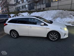White Toyota Auris 2013 in Vilnius, with an engine capacity of 1.80 L and mileage of 209 thousand km for 9350 €, photo 6 on AUTOMOTO.COM.LV