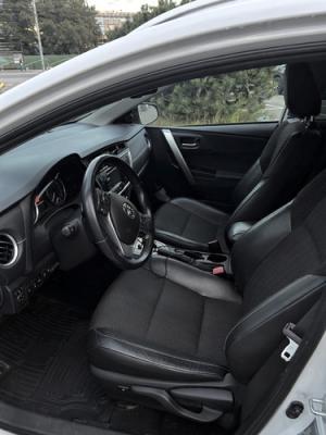 White Toyota Auris 2013 in Tallinn, with an engine capacity of 1.60 L and mileage of 110 thousand km for 9400 €, photo 6 on AUTOMOTO.COM.LV