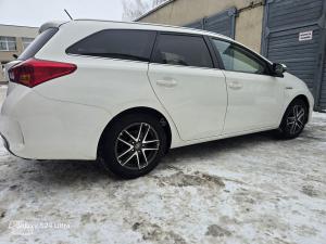 White Toyota Auris 2014 in Kaisiadorys, with an engine capacity of 1.80 L and mileage of 223 thousand km for 7600 €, photo 4 on AUTOMOTO.COM.LV