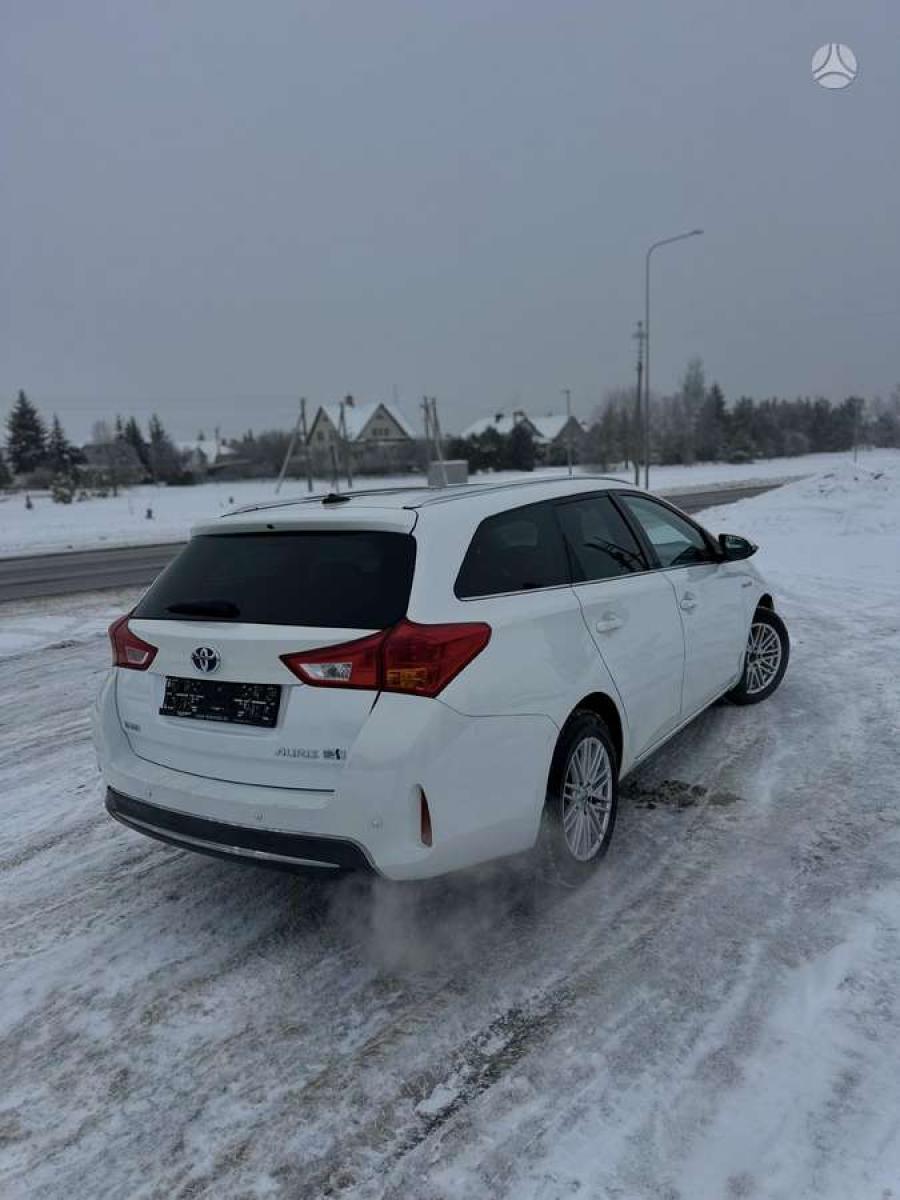 Белый Тойота Аурис 2014 в Мариямполе, объемом двигателя 1.80 л и пробегом 303 тыс. км за 6600 €, фото 5 на AUTOMOTO.COM.LV