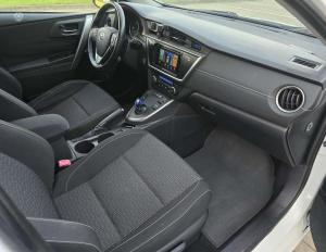 White Toyota Auris 2014 in Panevezys, with an engine capacity of 1.80 L and mileage of 298 thousand km for 7199 €, photo 12 on AUTOMOTO.COM.LV